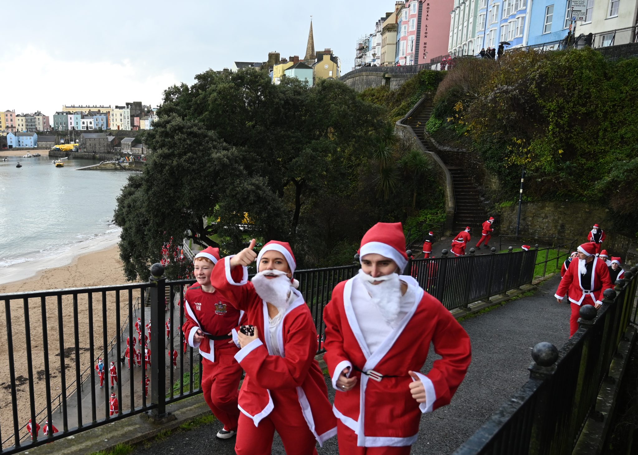 Tenby packed as Santa Run and lights switch-on launch festive season ...